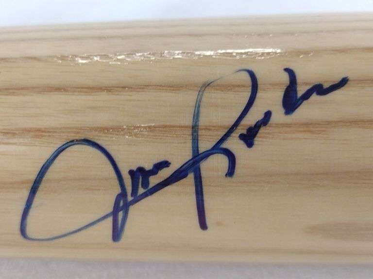 Jim Rooker autographed baseball bat. Blue sharpie on the barrel and ...