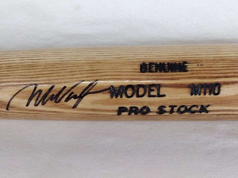 Miguel Tejada Autographed baseball bat. Black sharpie on the barrel ...