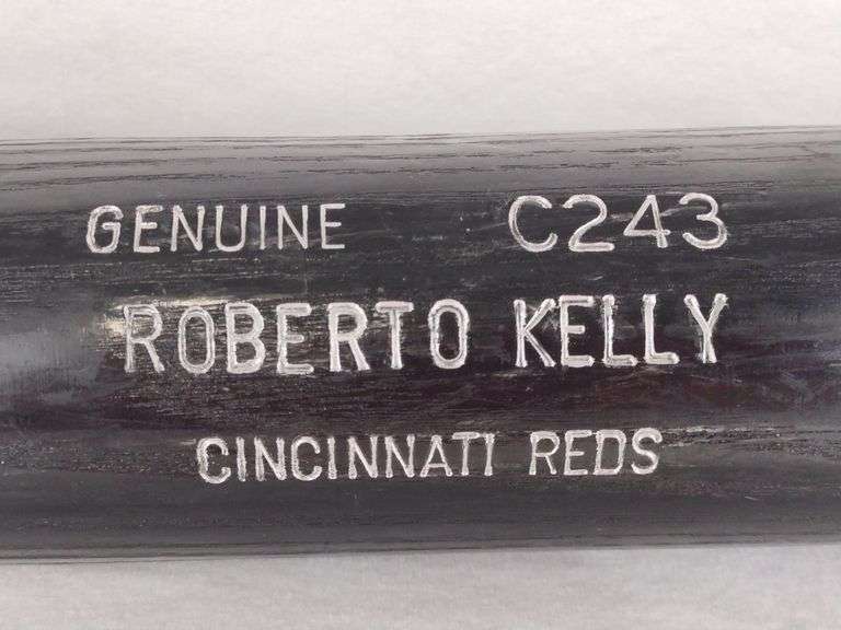 Roberto Kelly 1993 Game Used Autographed baseball bat. Silver sharpie ...
