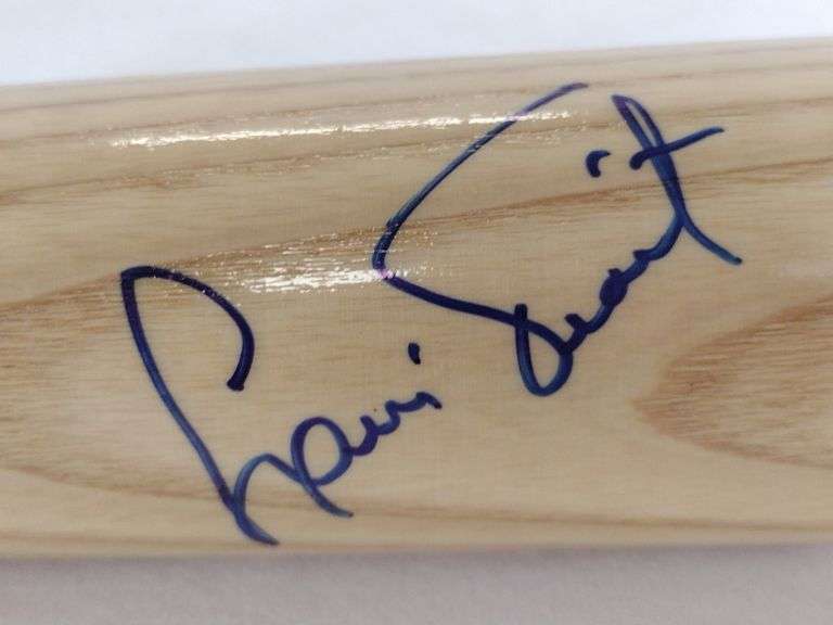 Louis Tiant autographed baseball bat. Blue sharpie on the barrel ...