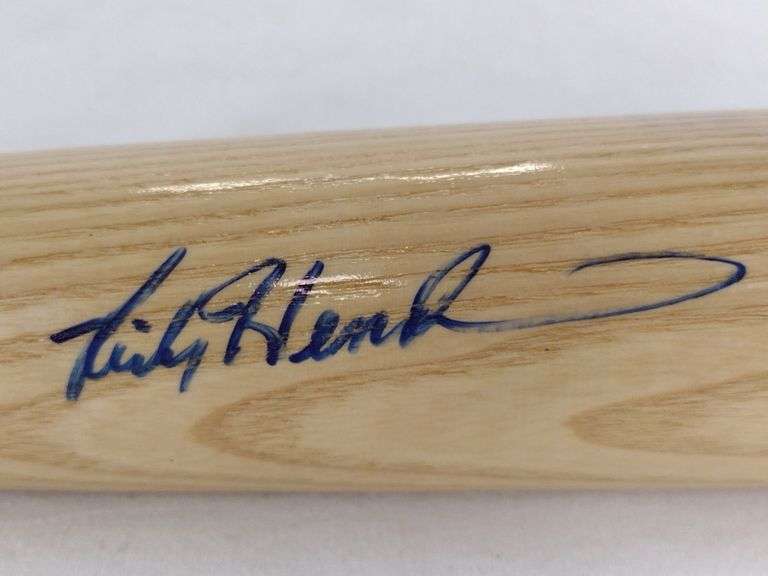 Rickey Henderson autographed baseball bat. Blue sharpie on the barrel ...