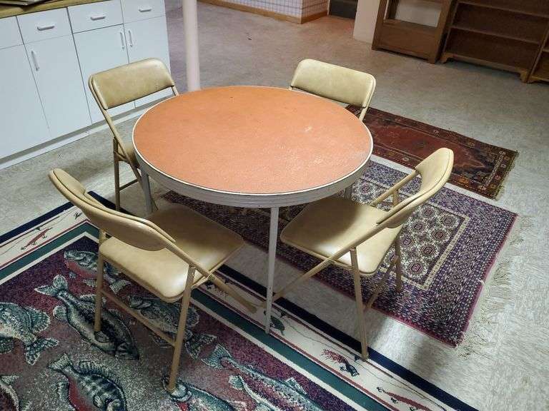 38-in round folding card table with four tan padded Costco chairs ...