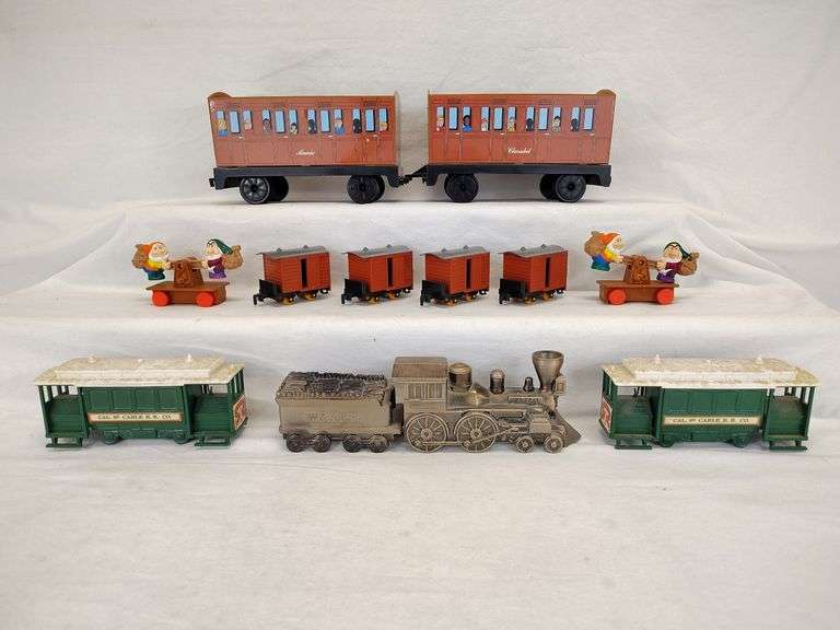 Box of assorted toy train memorabilia and collectibles including Avon ...