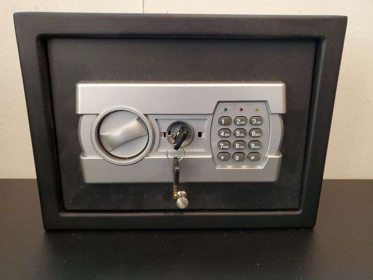 Stack On small home security safe measuring 12 in wide by 9 in tall ...