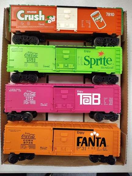 Four Lionel "soda pop" box cars including 7810 Orange crush, 9743 ...