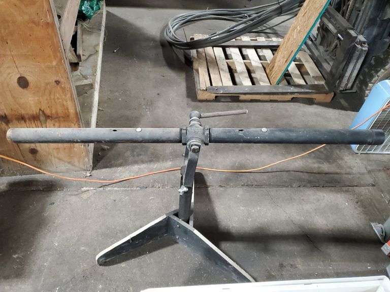 Adjustable metal stand. Top bar measures 57 in wide. - Bid-Assets ...