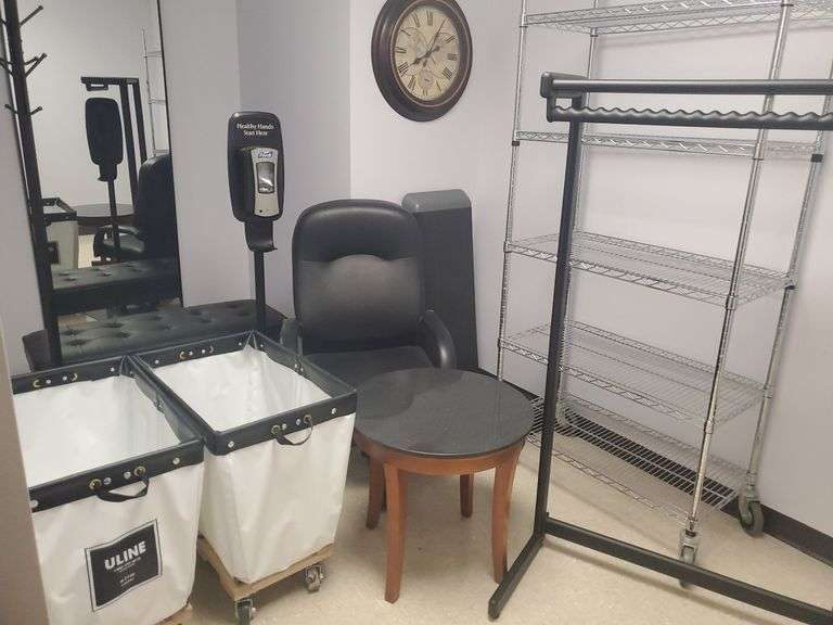 Entire contents of changing room including leather vinyl button down ...