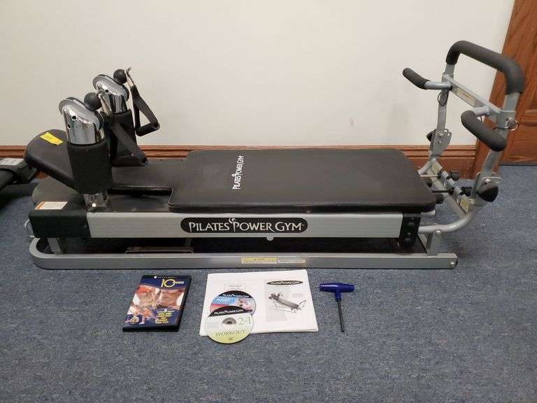 Pilates Power Gym model LGR01-01 includes owner's manual, workout DVDs ...