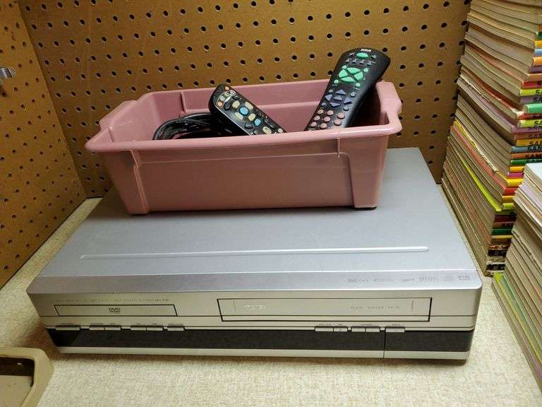 RCA VHS / DVD player model number DRC 6100N, includes remote and ...