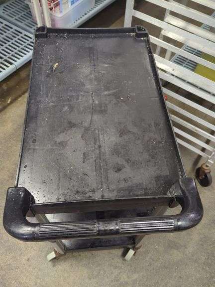 Fiberglass bussing cart 26x 16 x 33h. Three-tier. Located in cooler ...