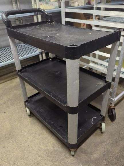 Fiberglass bussing cart 26x 16 x 33h. Three-tier. Located in cooler ...