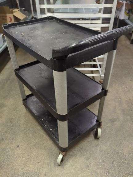 Fiberglass bussing cart 26x 16 x 33h. Three-tier. Located in cooler ...