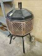Mini octagon shaped outdoor fireplace/grill. - Bid-Assets Online Auctions