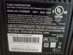 Emerson model LC320 EMXF 31 in flat screen TV with remote. Power's on ...