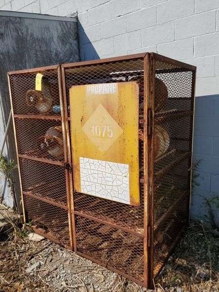 propane storage cabinet with (9) 20 lb propane tanks (empty) measures ...