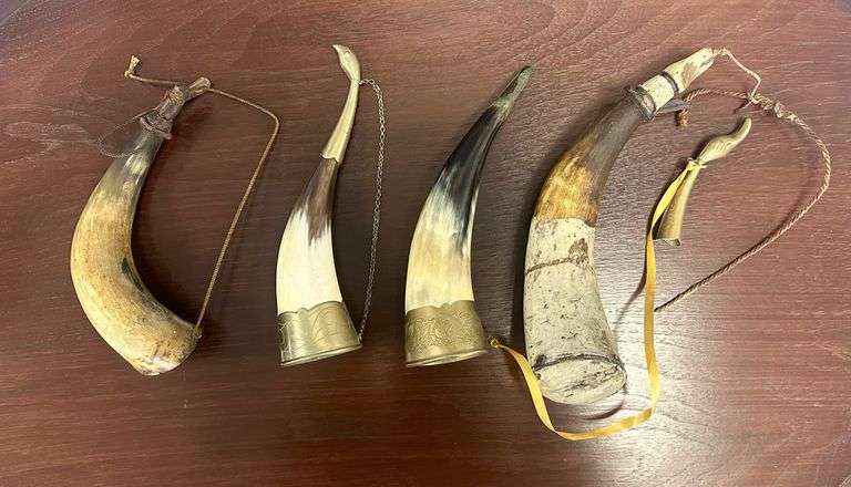 Collection of Four Powder Horns - Bartlett Auctions Inc.