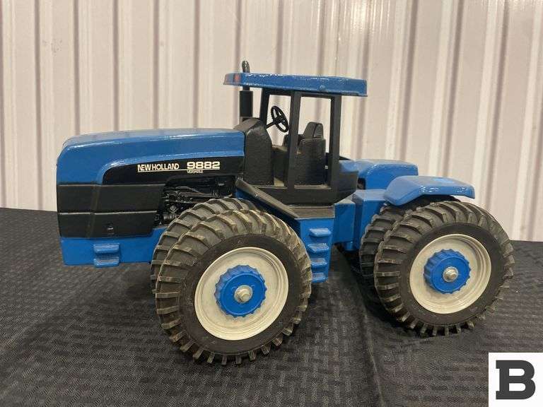 NewHolland 9882 Versatile Toy Tractor - Booker Auction Company