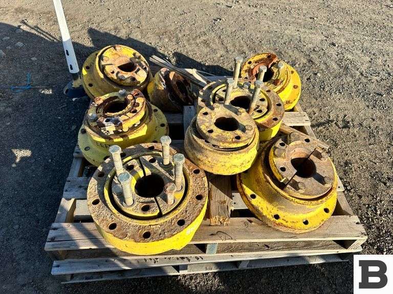 (8) Tractor Hubs - Booker Auction Company