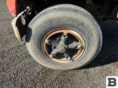 1975 Ford 800 Flatbed Truck - Booker Auction Company