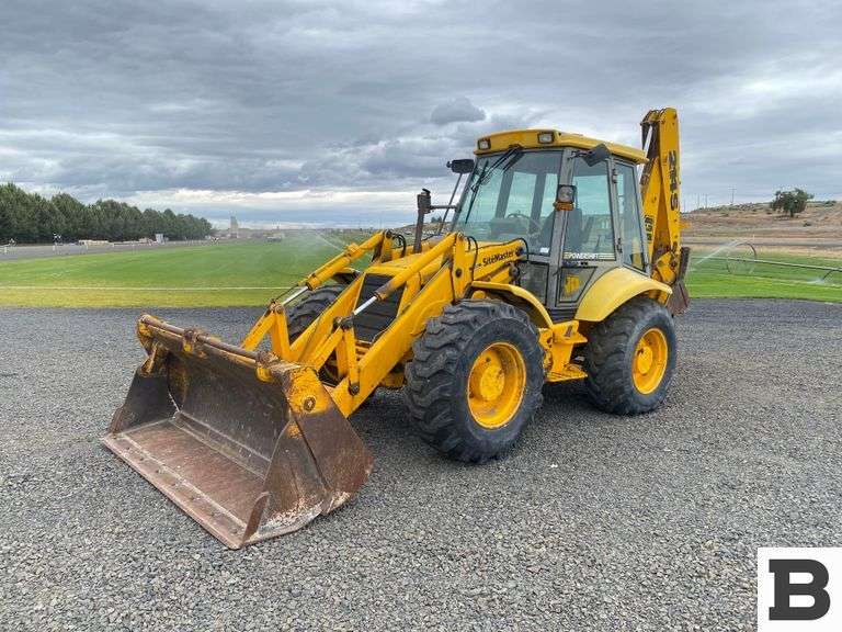 JCB 214S Backhoe - Booker Auction Company
