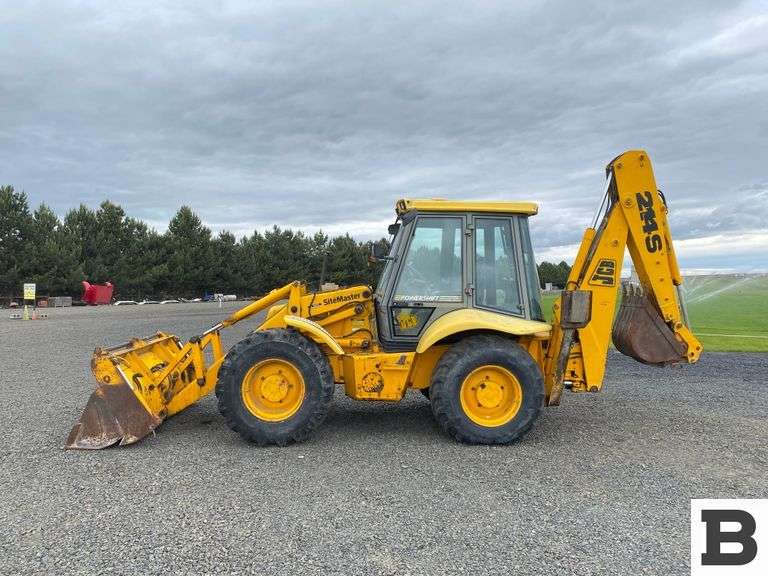JCB 214S Backhoe - Booker Auction Company