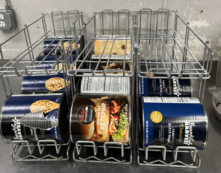 (3) Countertop Can Racks & Contents - Business Liquidation Auction