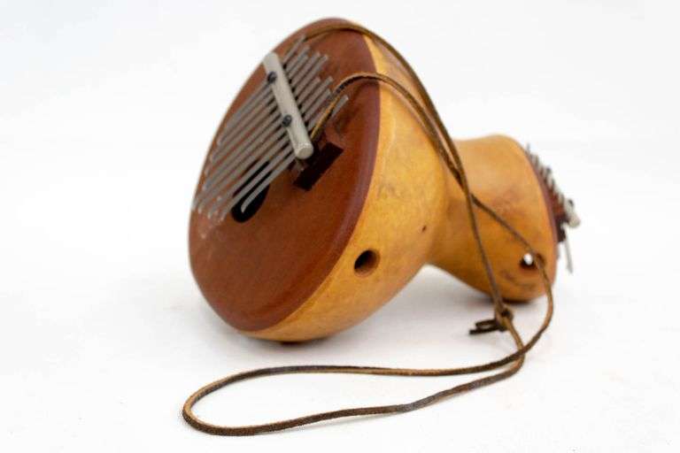 Finger harp or thumb piano is beautifully crafted with a wood top and ...