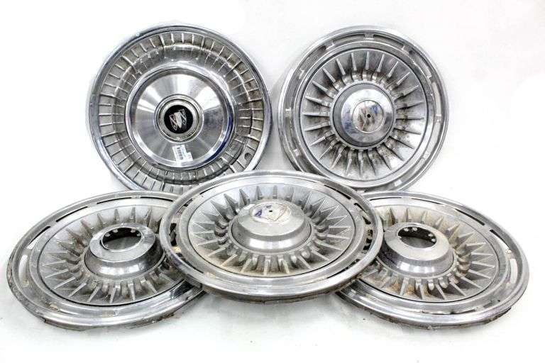 Buick 1970s Hubcaps. Set of four. - Bunting Online Auctions