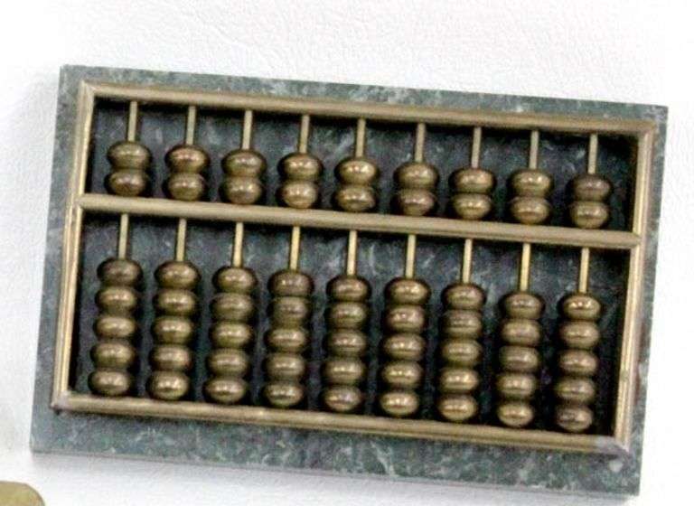 Vintage abacus on stone display slab - Bunting Online Auctions