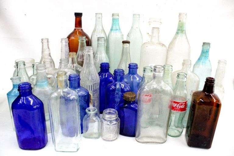 Vintage glass bottle collection, includes Moroline petroleum jelly jar ...