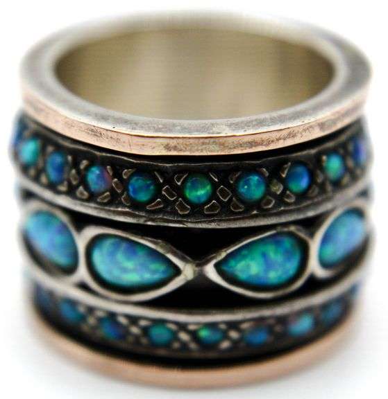 Sterling Silver Ring accented with 14 KT Gold and set with Opal stones ...