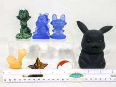 Carved Crystal and Stone Pokemon figures - Some with Labels - Bunting ...