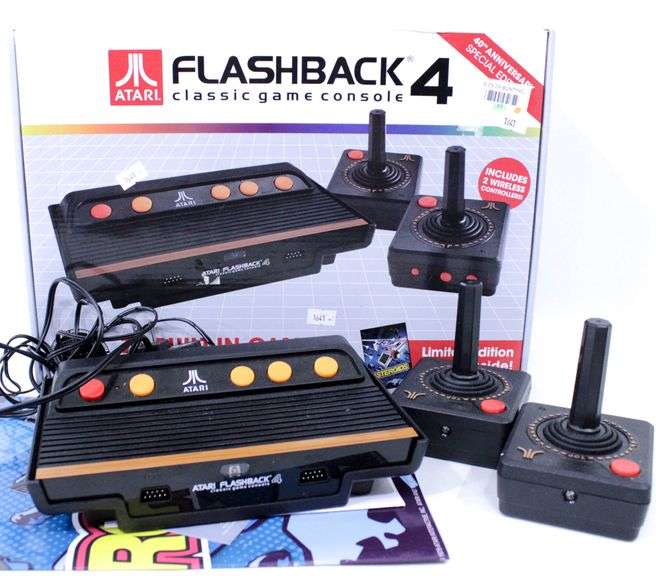 Atari Flashback 4 Classic Game Console with Controllers 2012 - Bunting Online Auctions