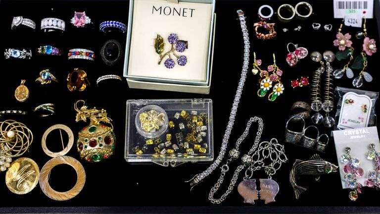 Rings of different sizes, designs and styles; Earrings of different ...