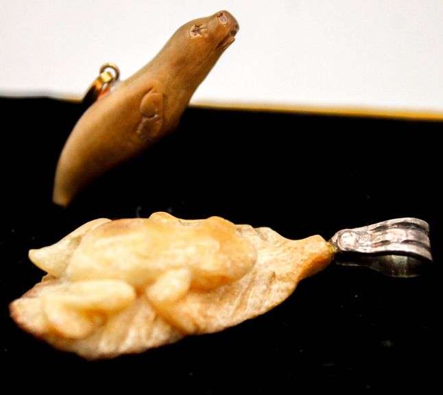 Hand carved Sea Lion and Frog Pendants from highly polished bone ...