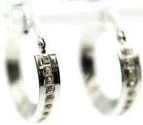 14 KT white Gold hoop Earrings, snap bar closure. - Bunting Online Auctions