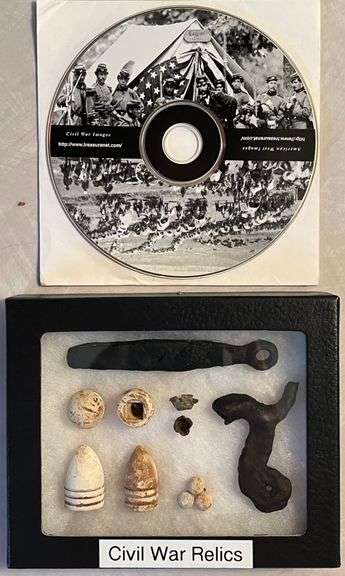 Civil war relics , Includes a musket hammer , A bullet and several ...