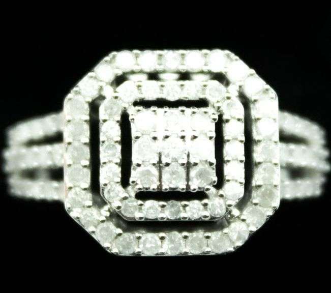 Ring marked 10K P, studded with crystals, size 8., in a gift box ...