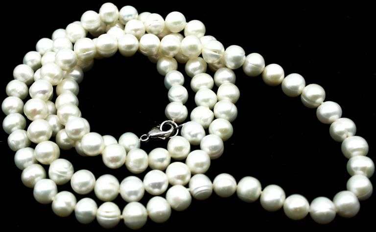 Genuine Pearls, 36" of Pearls with a Sterling Silver clasp on knotted ...