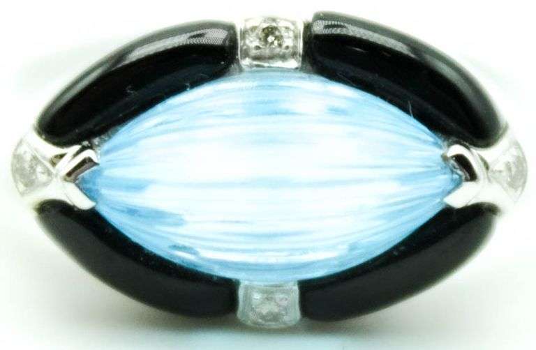 14 KT White Gold, Diamond, and Topaz (both tested) Ring. Ripple cut ...
