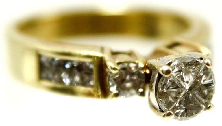 18 KT Gold Diamond Ring, size 10. Principle diamond, offset with 2 side ...