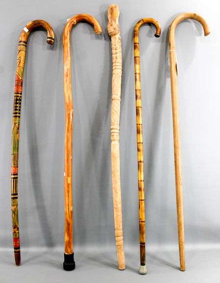Five Wooden Walking Canes. - Bunting Online Auctions