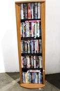 Two boxes of DVDs and DVD Tower. - Bunting Online Auctions