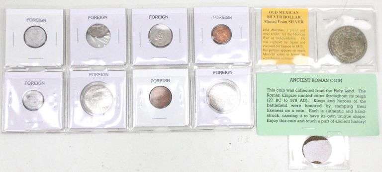 Forign coins including a Mexican " Silver Dollar " and an ancient roman ...