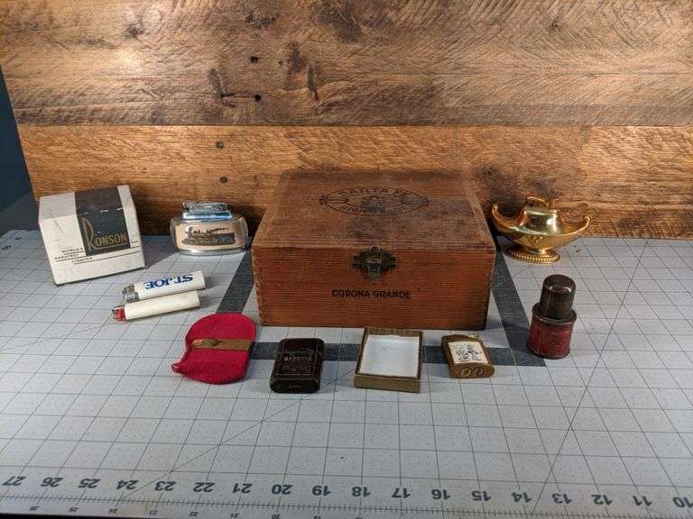CIGARETTE LIGHTERS. ZIPPO WITH LEATHER CLAD BABCOCK LUMBER CASE, RISQUÉ ...