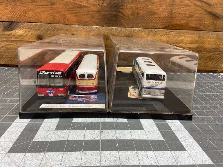 3 Corgi Model Busses in Display Cases - Bid On Estates Auction Services