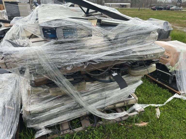 Row of Trunk Safes and Police Lights - Bonnette Auctions