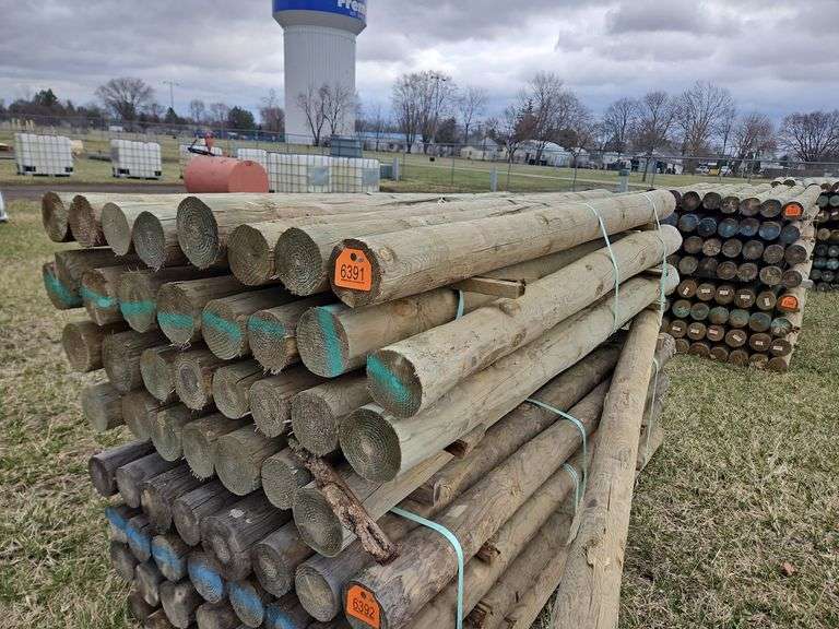 6391 - 4 5/8"X7" TREATED FENCE POST (32) - Bonnigson & Associates