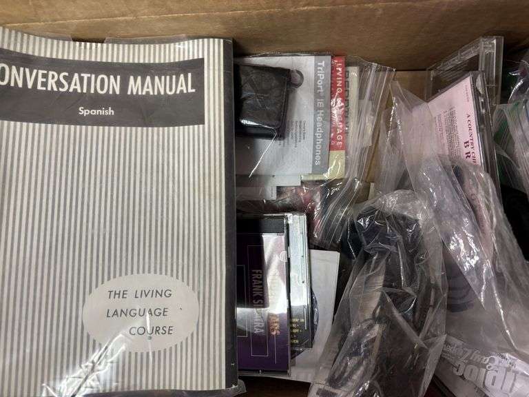 CDs and Spanish lesson book, cassettes - Bonnigson & Associates