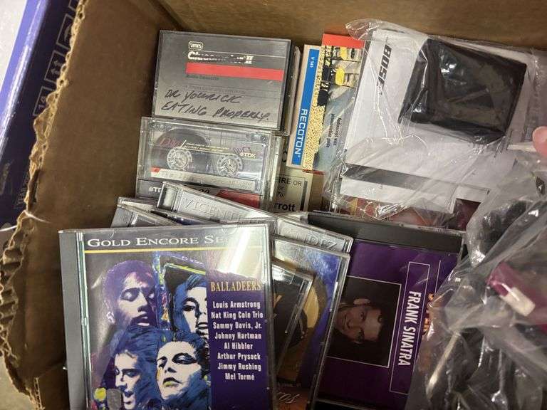 CDs and Spanish lesson book, cassettes - Bonnigson & Associates